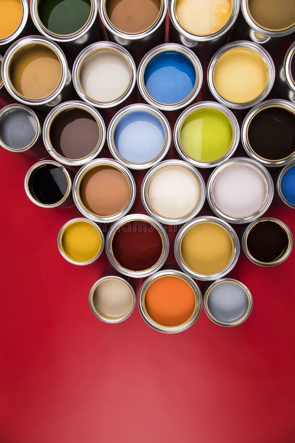Collection of Colored Paints Cans, Red Background Stock Image - Image ...