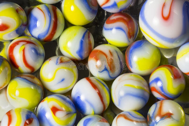 Yellow Swirl Marbles stock photo. Image of yellow, colorful - 30137776