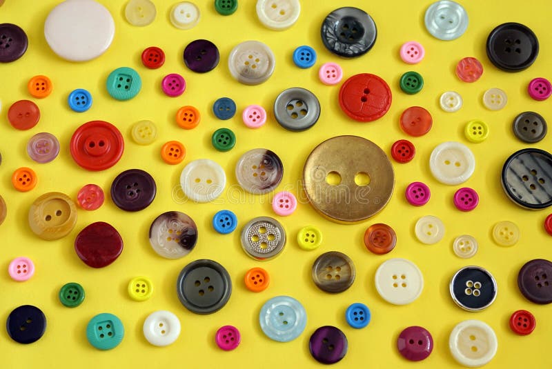 Collection of Colourful Sewing Buttons on Yellow Background Stock Image ...
