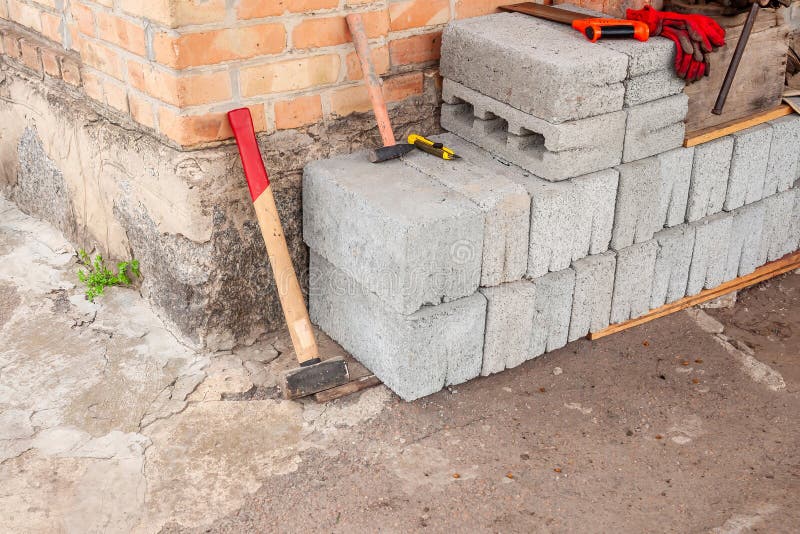 A Collection of Construction Tools and Materials are Positioned Near a ...