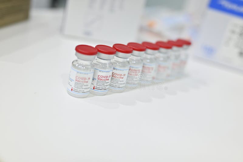 A Group of Medicine Vials for Covid Vaccine on a Solid Background Stock ...