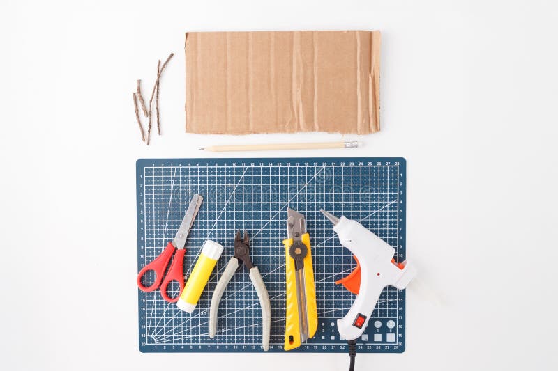Collection of Crafting Tools and Materials Arranged on a White Surface ...