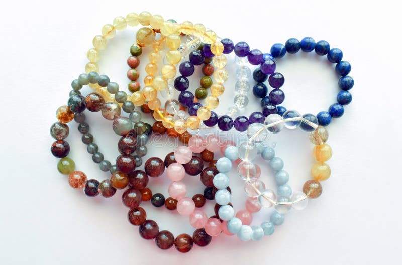 Collection of Crystal Gemstones Bracelet on the Table. Stock Photo ...