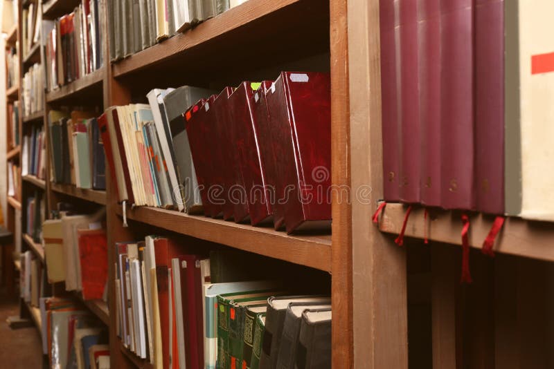 Collection of Different Books on Shelves in Library Stock Image - Image ...