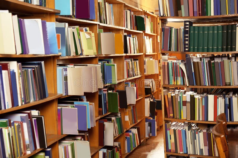 Collection of Different Books on Shelves in Library Stock Image - Image ...