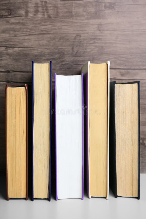 Collection of Different Books on White Shelf Stock Photo - Image of ...