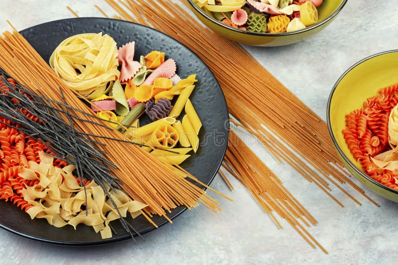 Collection of Different Raw Pasta on Table Stock Photo - Image of heap ...