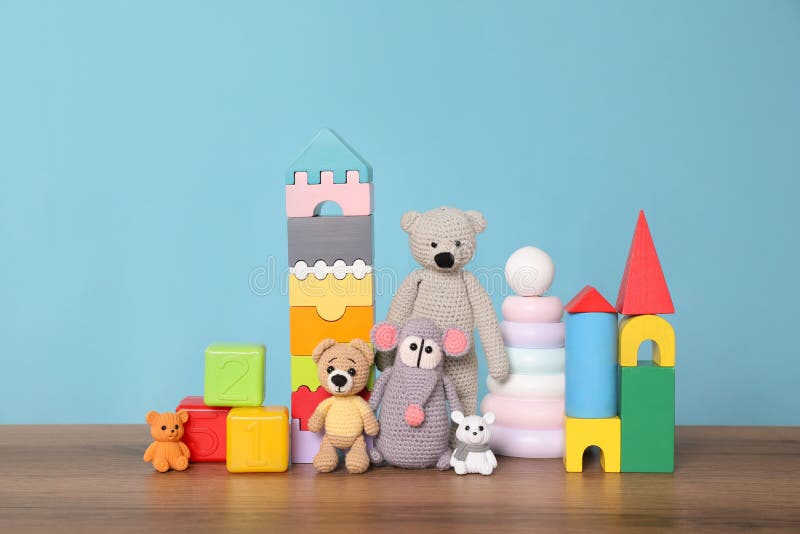 Collection of Different Toys on Wooden Table Stock Photo - Image of ...