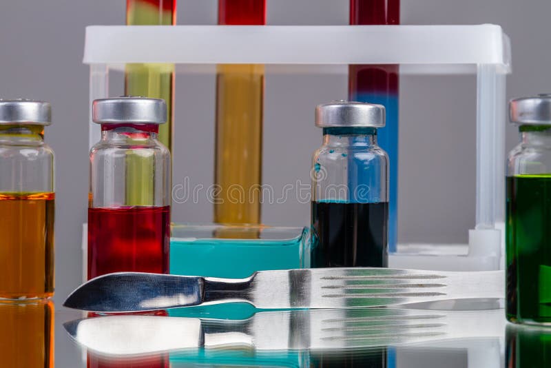 Collection of Drug Vials with Colored Solution. Stock Image - Image of ...