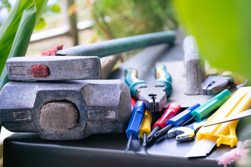 Collection of Essential Hardware Tools Like Screwdriver, Hammer, Wrench ...