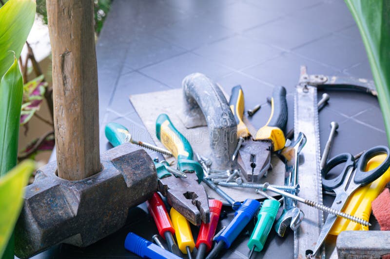 Collection of Essential Hardware Tools Like Screwdriver, Hammer, Wrench ...