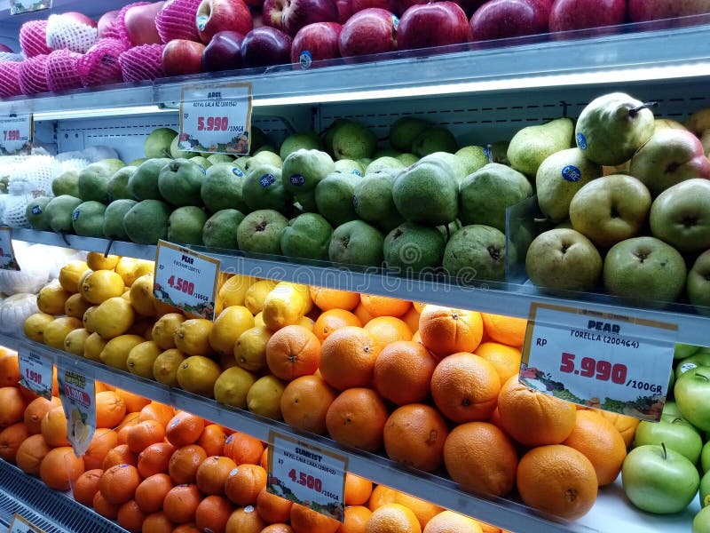 A Collection of Fresh Fruit Arranged Neatly on the Fruit Shelf Stock ...