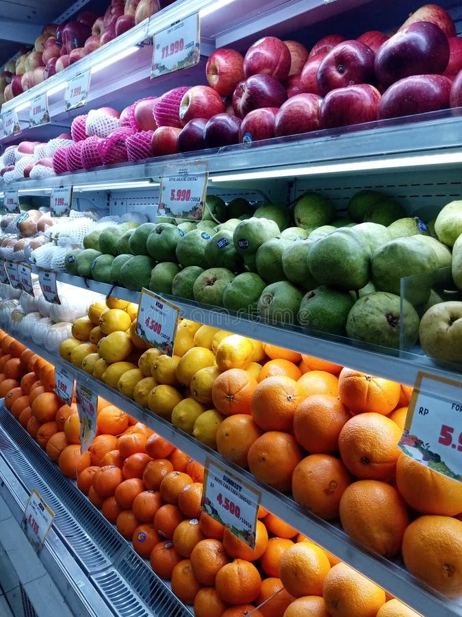 A Collection of Fresh Fruit Arranged Neatly on the Fruit Shelf Stock ...