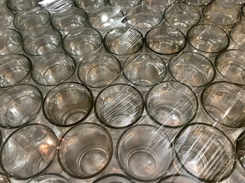 A collection of glass cups stock photo. Image of collection - 147335870