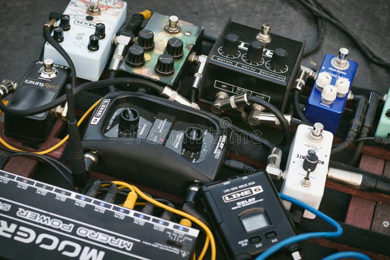 A Collection of Guitar Effect Pedals Daisy-chained Together in a Rig ...