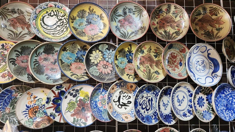 Collection of Hand-Painted Ceramic Plates with Floral and Calligraphic ...