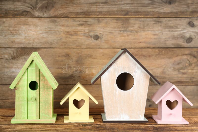Collection of Handmade Bird Houses on Wooden Table Stock Photo - Image ...
