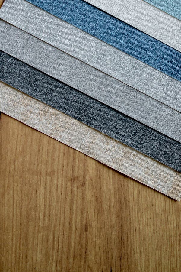 A Collection of Interior Wallpaper Samples in Textured Blue Shades ...