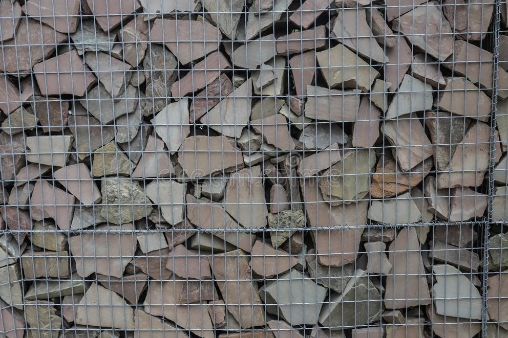 Collection of Irregular Stone Pieces Held in a Wire Mesh, Used for ...