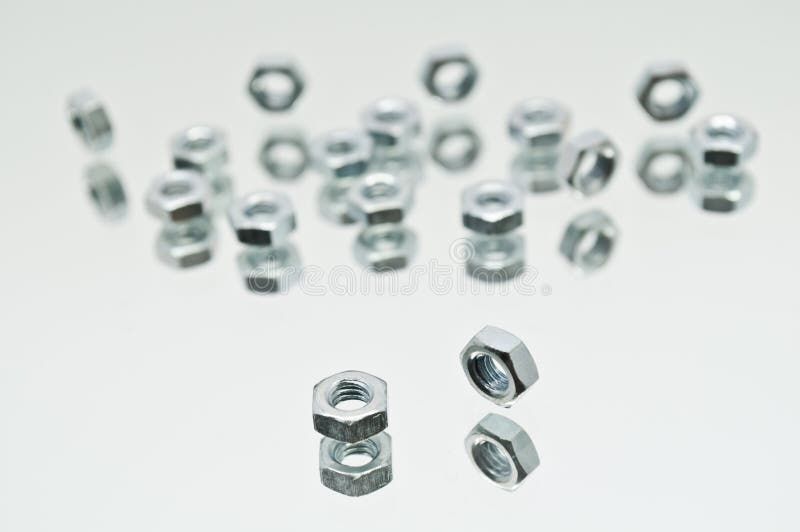 Iron nuts stock image. Image of background, idea, shadows - 123724077