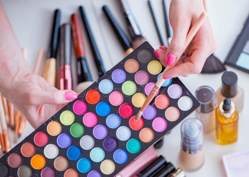 The Collection of Make Up Products Displayed on the Table Stock Photo ...