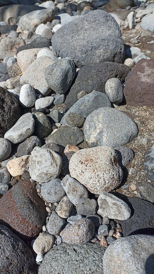 A Collection of Medium-sized River Rocks is Usually Used As a Mixture ...