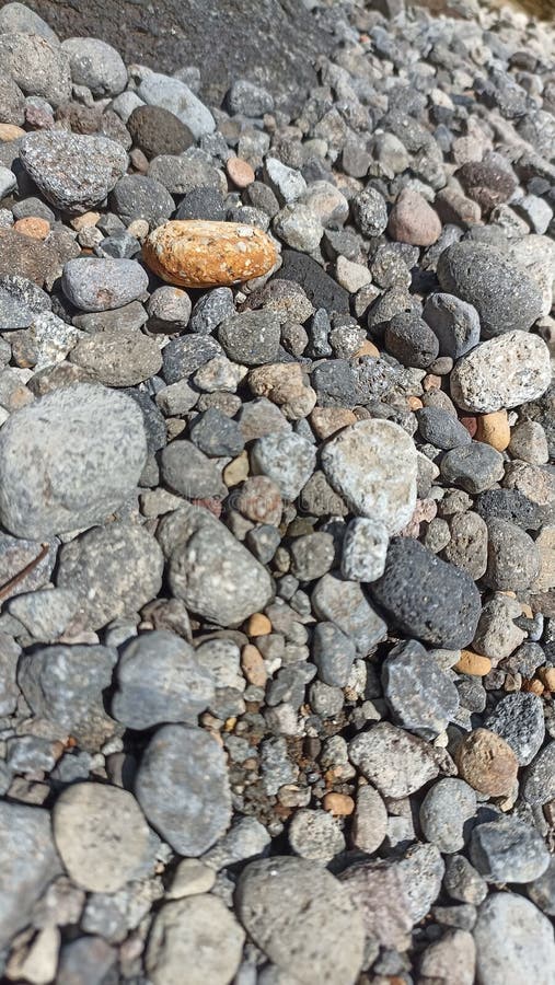 A Collection of Medium-sized River Rocks is Usually Used As a Mixture ...