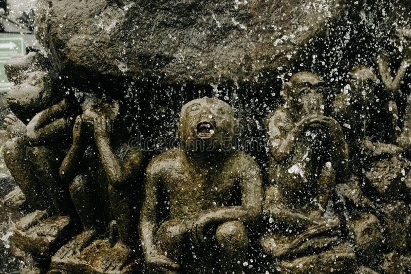 Monkey Statue Under Pouring Water Stock Photo - Image of pouring ...