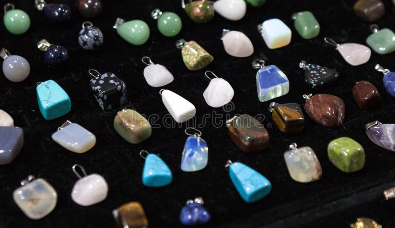 Collection of Multi-colored Pendants from Different Gems Stock Image ...