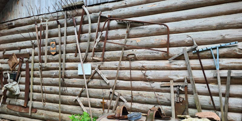Collection of Old Agricultural Tools Gathered on the Wooden Wall of the ...
