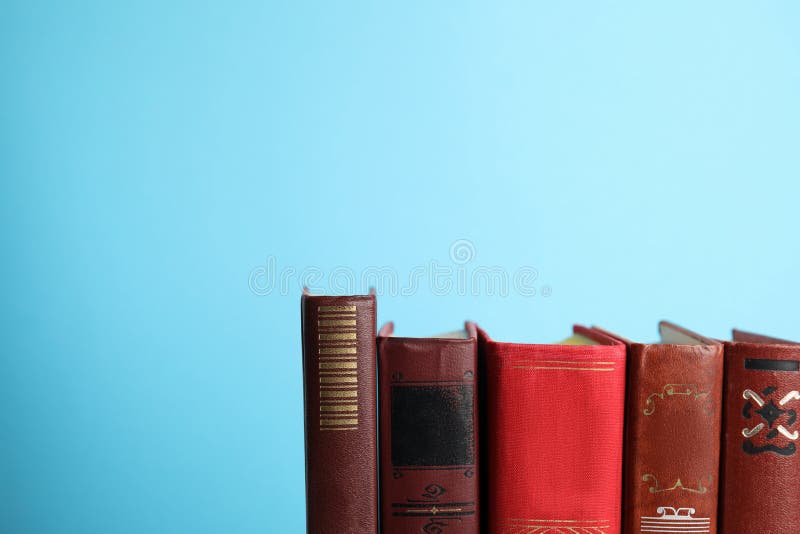 Collection of Old Books on Light Blue Background Stock Image - Image of ...