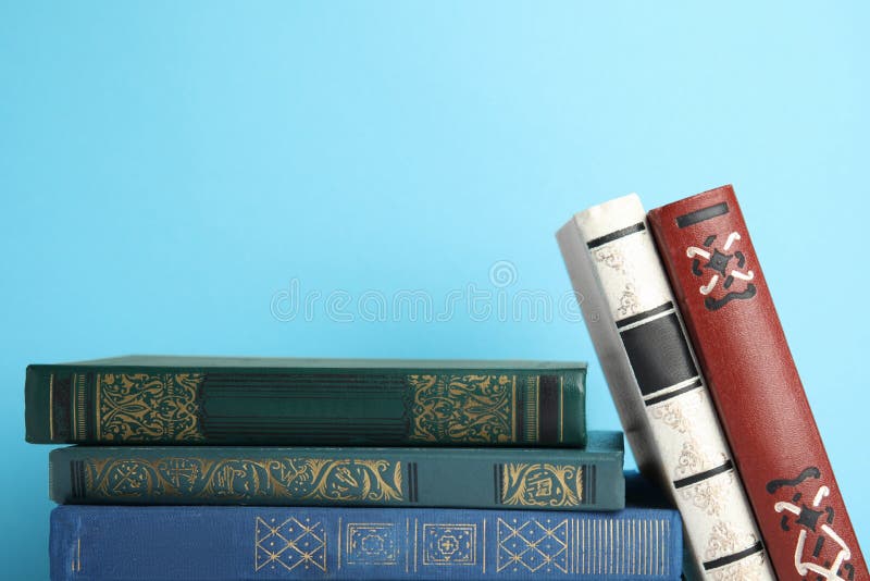 Collection of Old Books on Light Blue Background Stock Image - Image of ...
