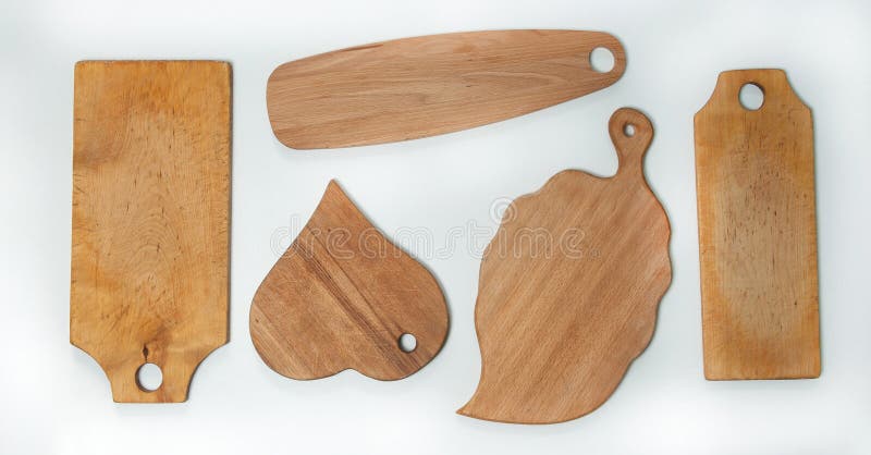 Collection of Old Cutting Boards of Different Shapes and Sizes on a ...