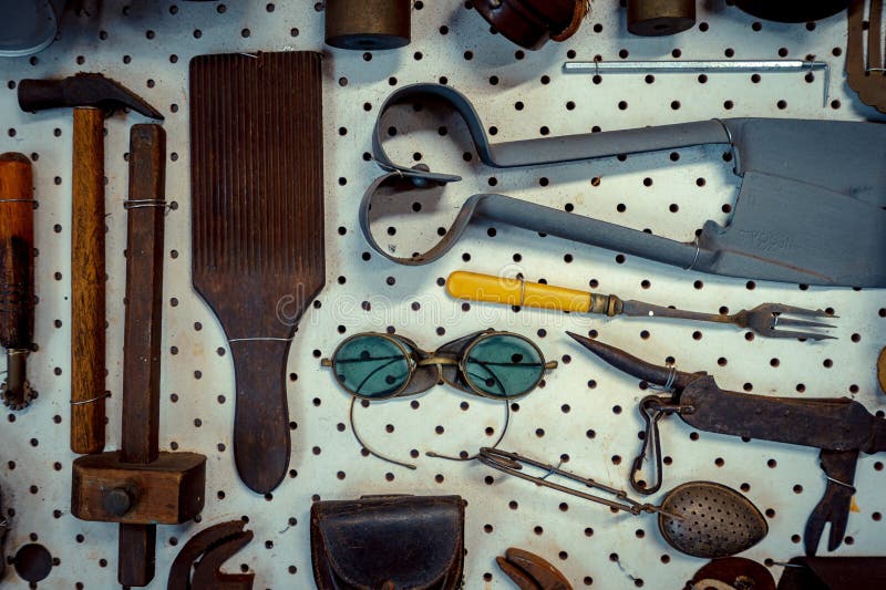 A Collection of Old Hand Tools Arranged on the Wall Stock Photo - Image ...