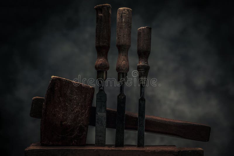 Collection of Old Rusty Carbon Steel Chisels with Carving Hammer Behind ...