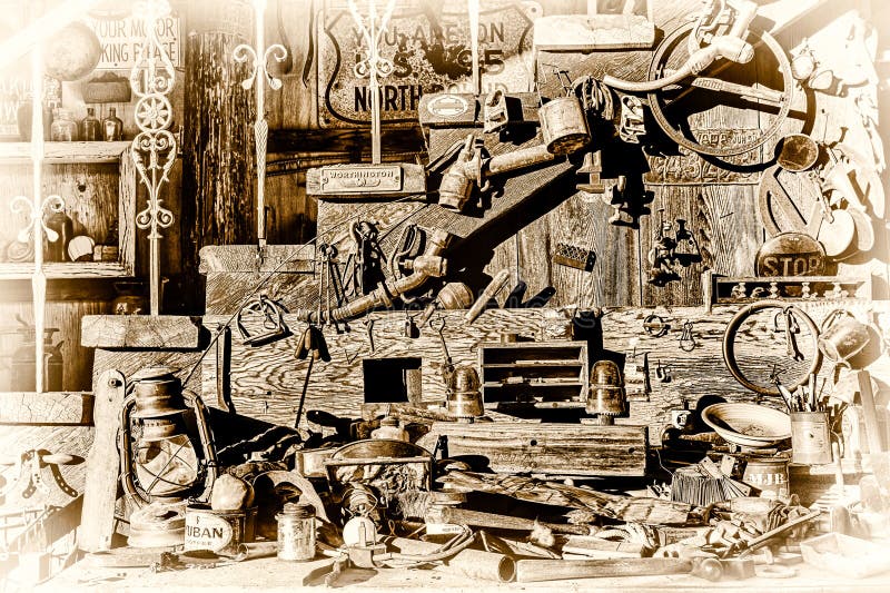 A Collection of Old Tools and Items are Displayed in a Cluttered Manner ...