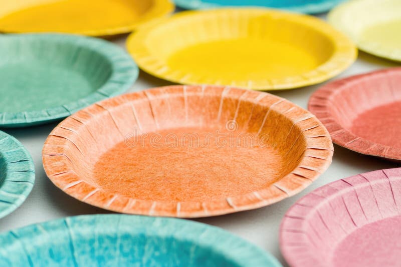 A Collection of Paper Plates Stacked on a Table, Ready for Use Stock ...