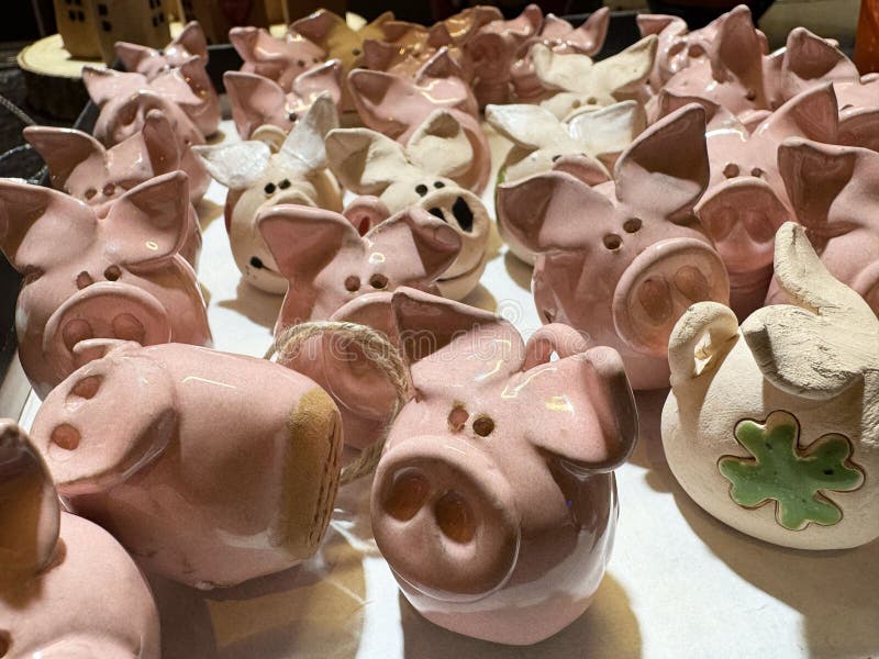 Collection of Pink Ceramic Pig Figurines on Display Stock Image - Image ...