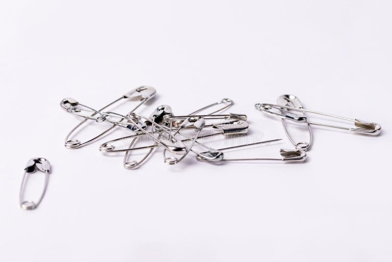 Collection of Pins of Different Sizes on a White Background. Stock ...