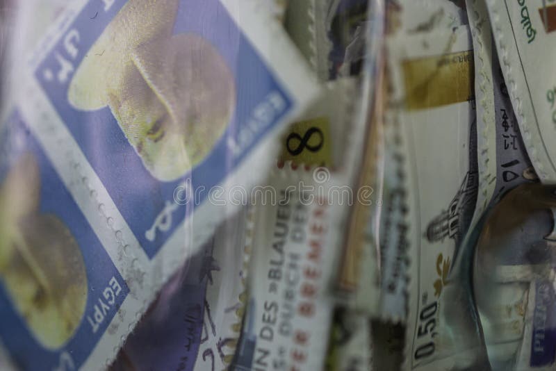 Collection of Postage Stamps in a Jar Editorial Stock Image - Image of ...