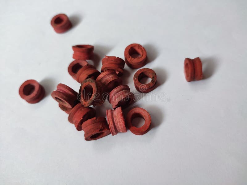 Collection of Red Rubber Gas Cylinders Isolated on White Background ...