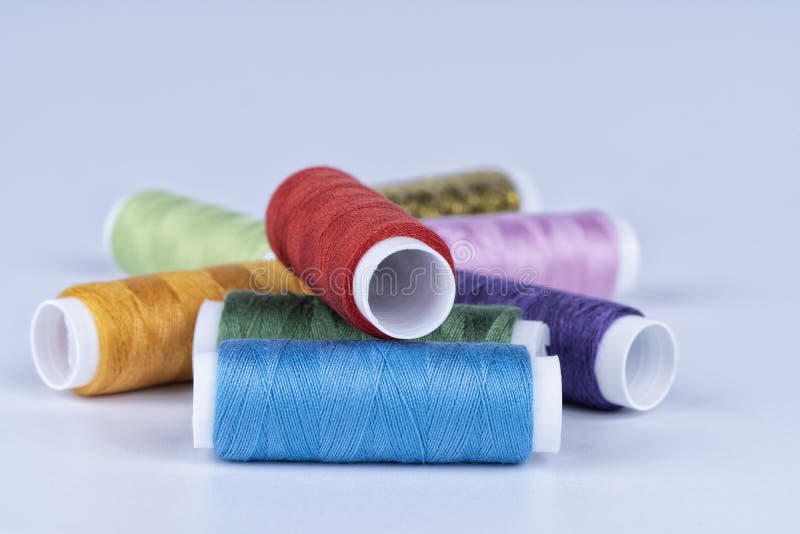 Collection of Sewing Thread Spools with Threads of All Colors Stock ...