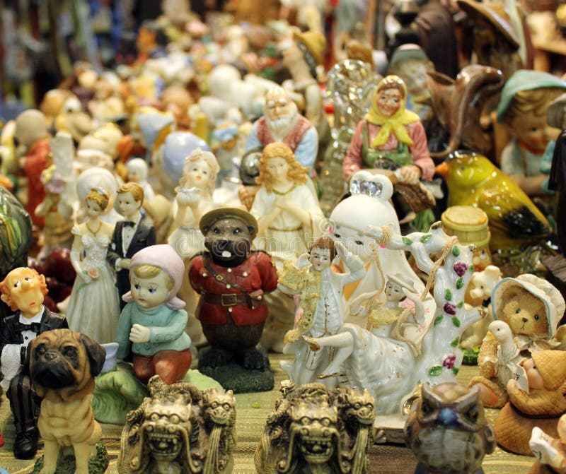 Collection of Small Ceramic Figurines in a Market Editorial Photography ...