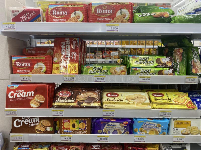 A Collection of Snacks or Biscuits Arranged on a Shelf at the Indomaret ...