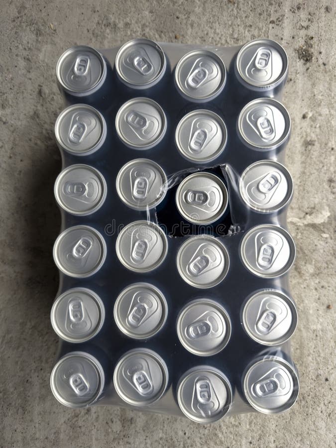 Collection of Soda Cans Arranged in a Uniform Pattern on a Surface ...