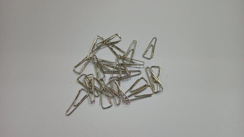 A Collection of Triangles Clips on Paper Stock Image - Image of paper ...