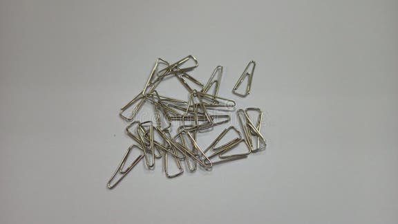 A Collection of Triangles Clips on Paper Stock Image - Image of paper ...