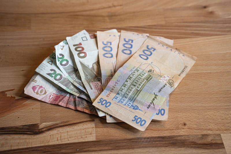 Collection of Ukrainian Banknotes on a Wooden Surface Stock Image ...