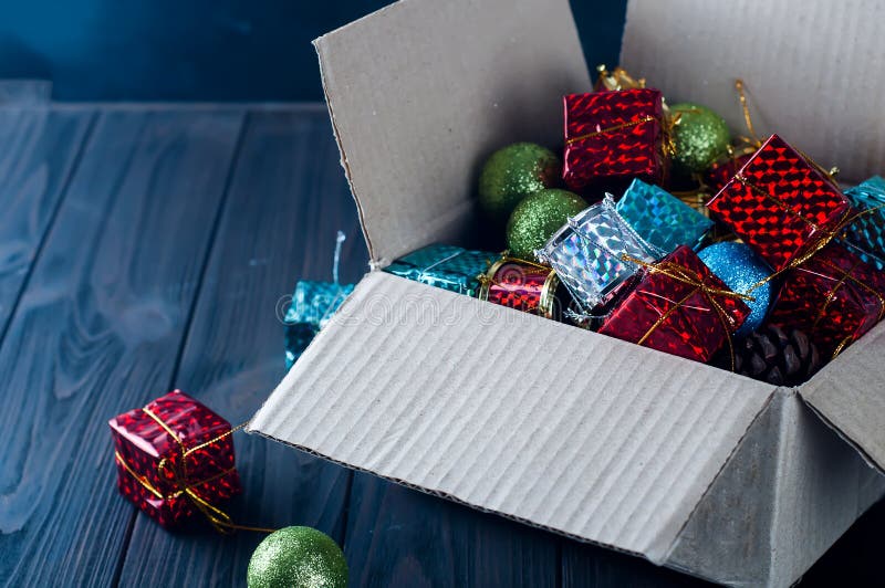Collection of Various Christmas Decorations, Placed into Cardboard Box ...