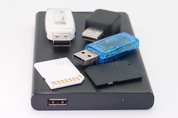 Collection of Various Data Storage Devices on a Black Portable Hard ...